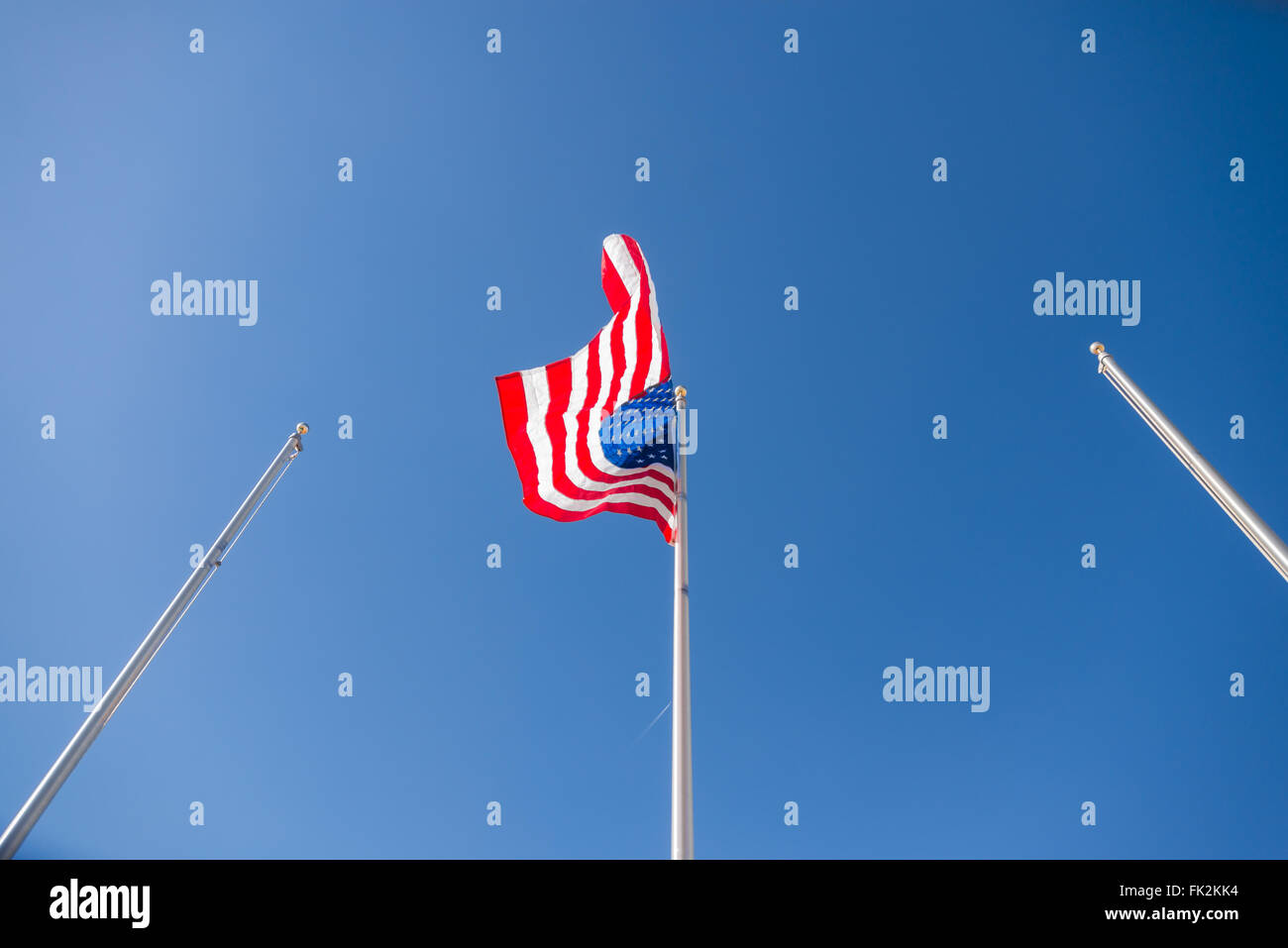 United States of America Flag on column with blue sky Stock Photo - Alamy