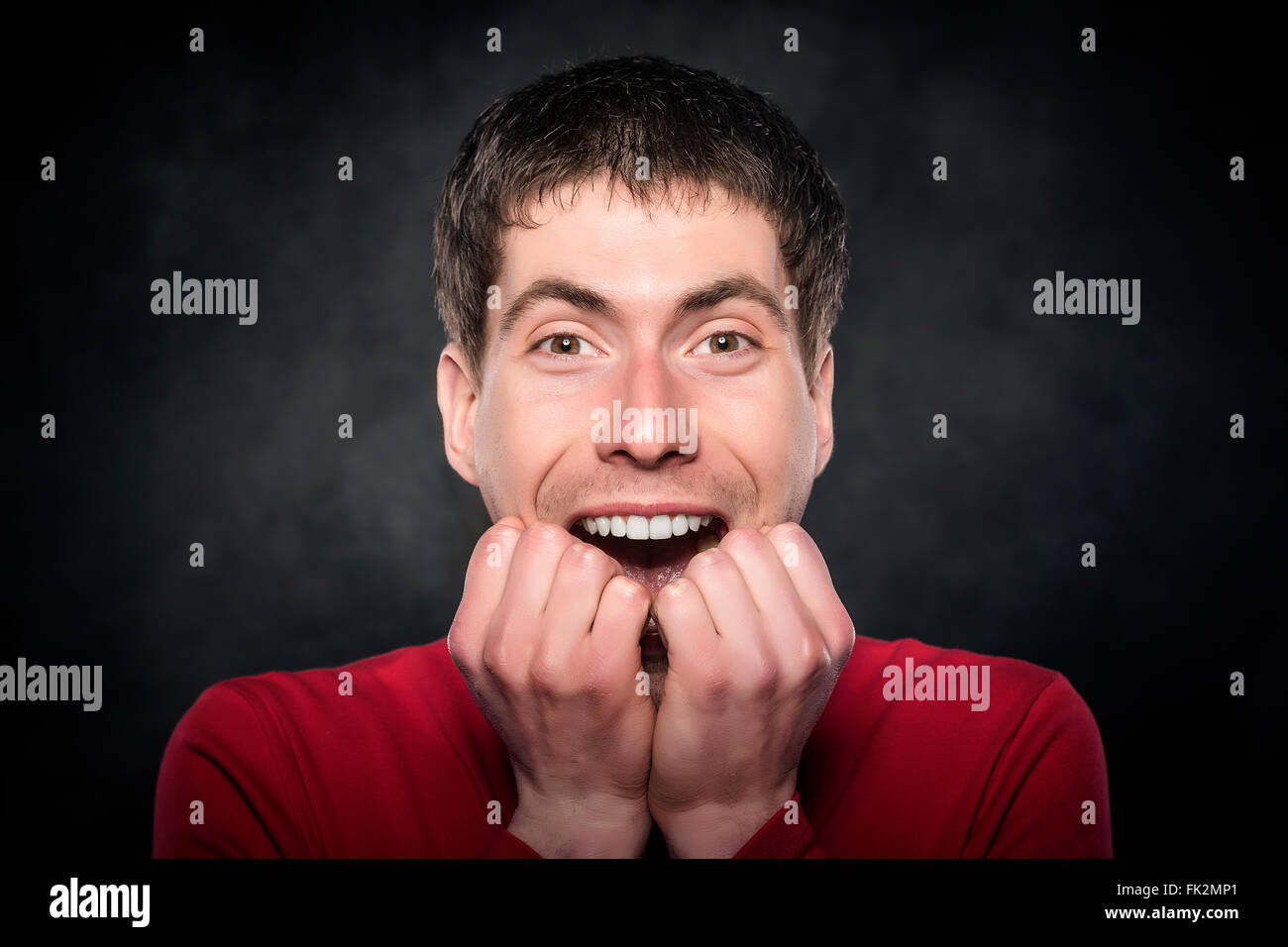 Excited young man Stock Photo - Alamy