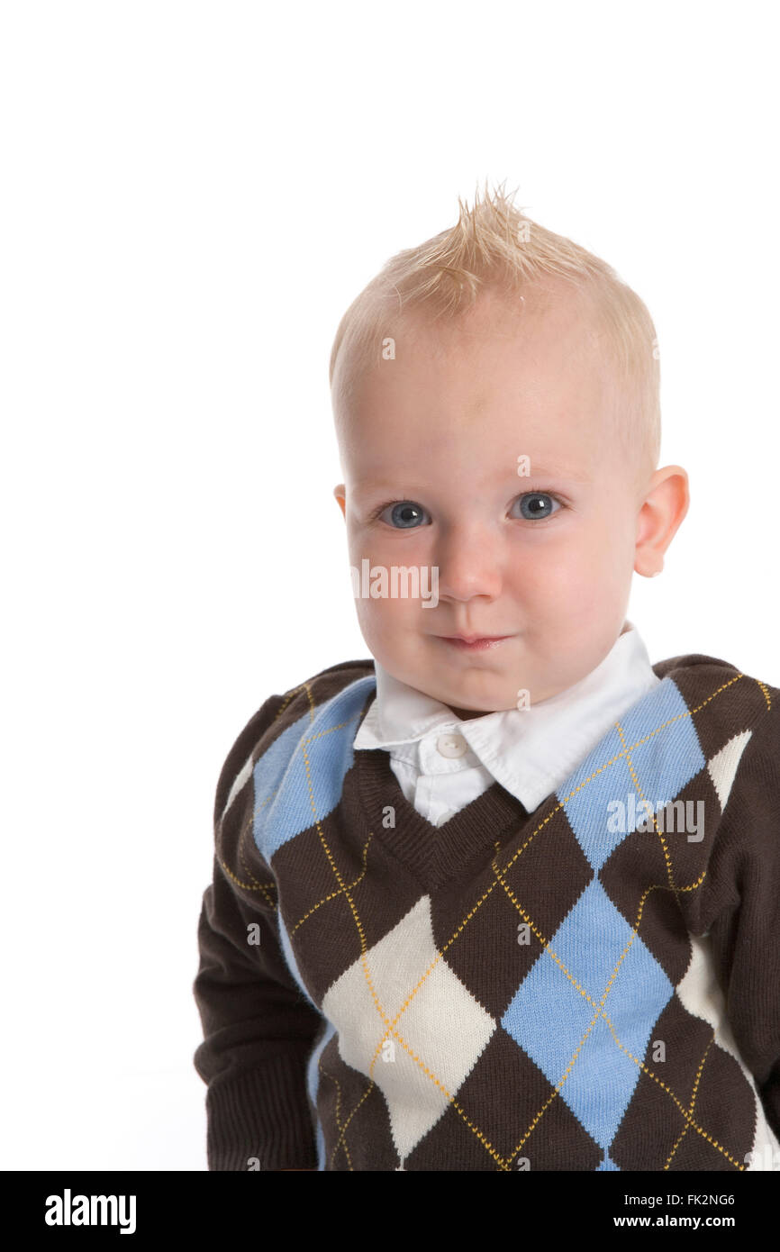 Portrait of a serious toddler boy on white background on white ...
