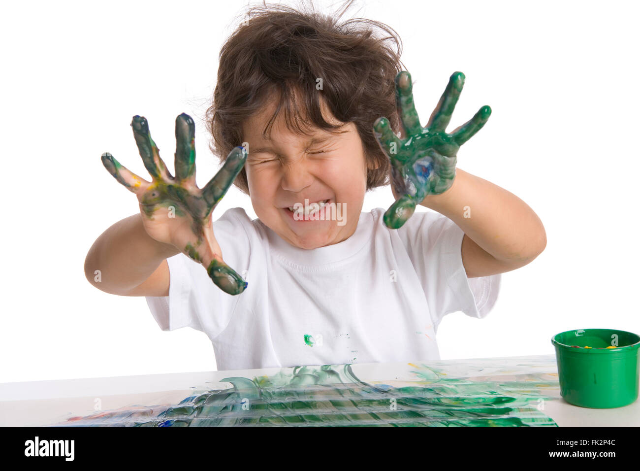 Little Boy Is Showing His Very Dirty Fingers With Paint on white ...