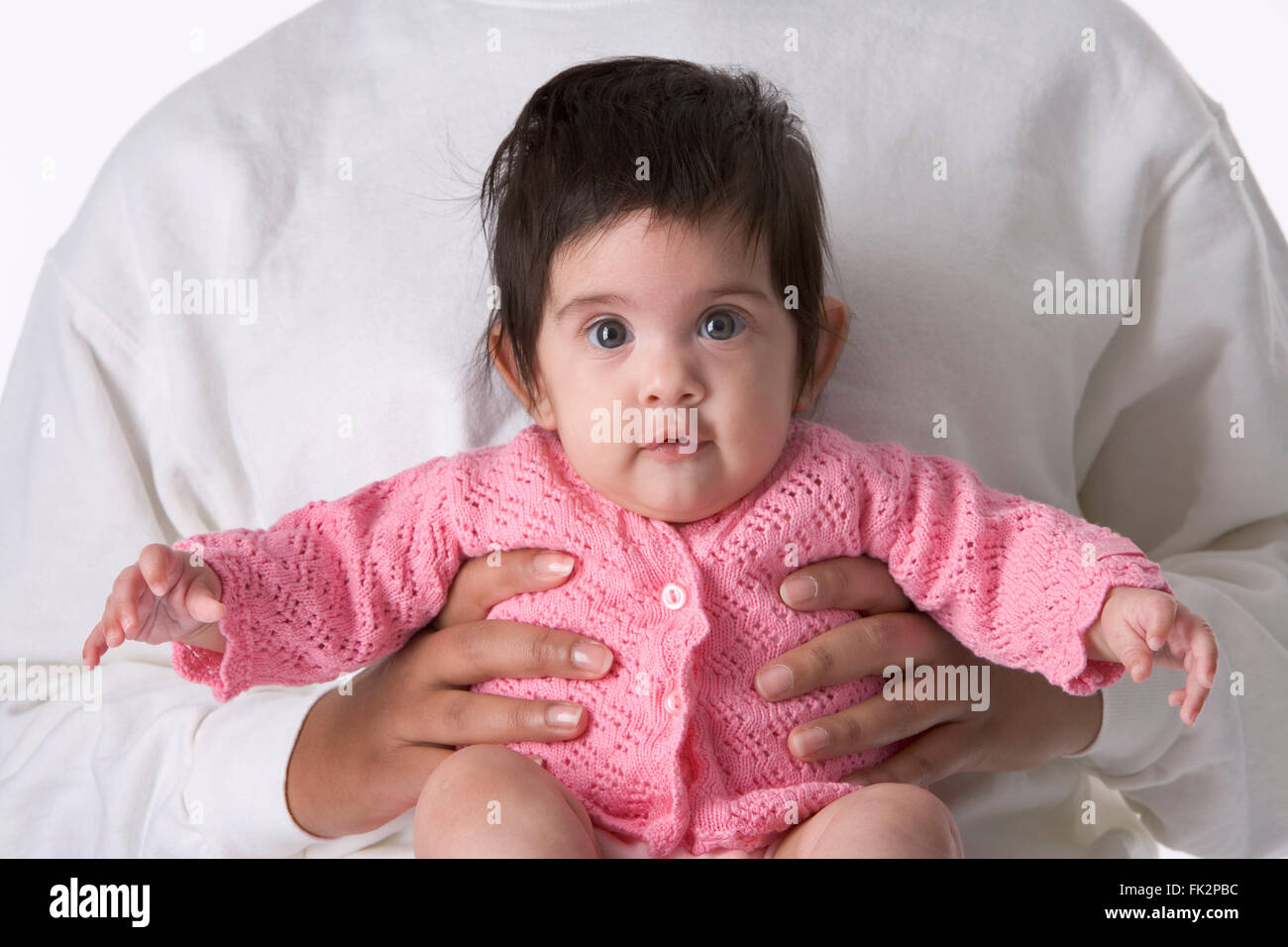 Girl sitting on mothers lap hi-res stock photography and images - Alamy