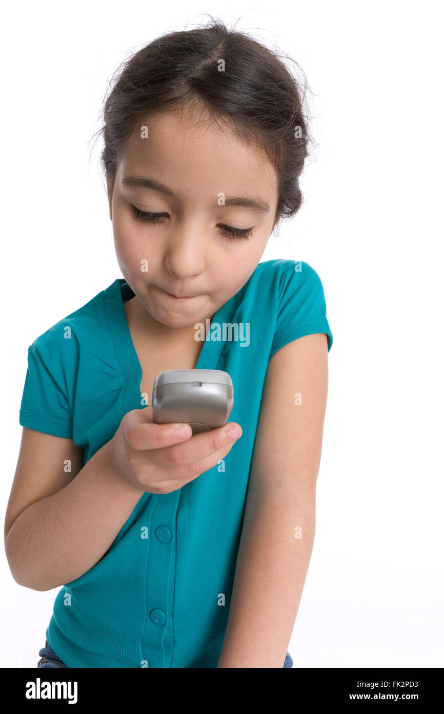 Little Girl Is Reading A Text Message On Her Mobile Phone With A Tensed ...