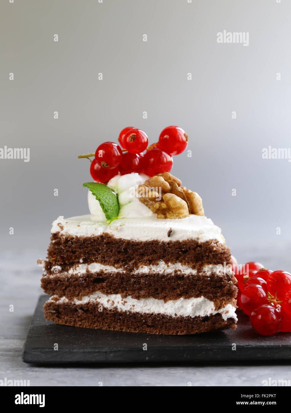 portioned dessert piece of cake with cream and berries Stock Photo - Alamy