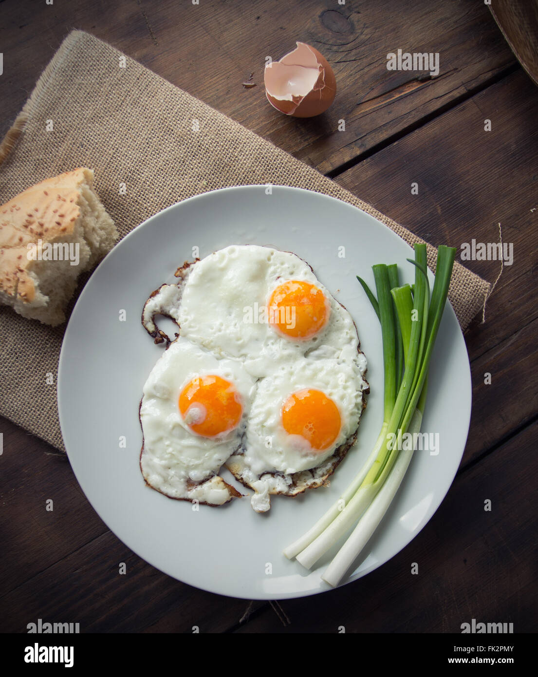 Breakfast with fried eggs and spring onion Stock Photo - Alamy
