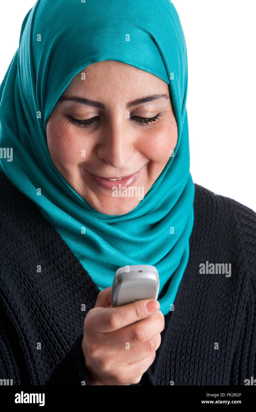 Portrait of a happy Arabic Muslim Woman reading a text message Stock ...