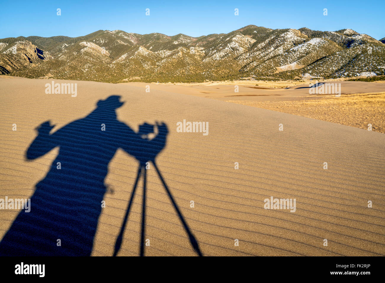 a photographer shooting - a shadow of a photographer with a camera and ...