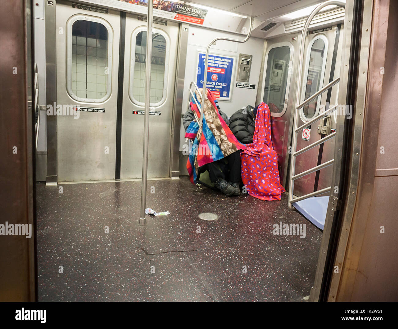Homeless individuals in the subway in New York on Saturday, March 5 ...