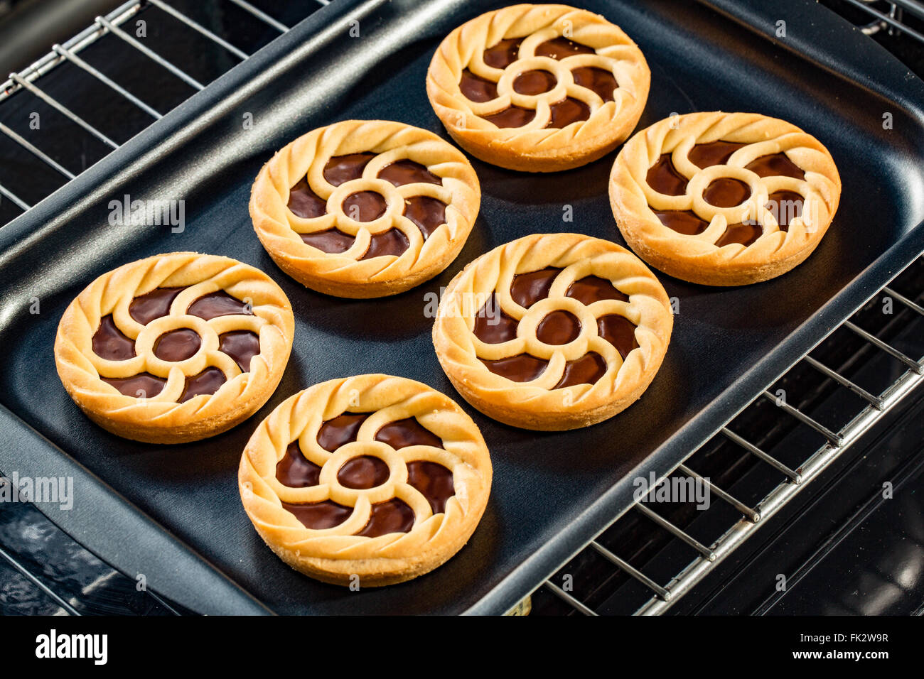 Baking in the oven. Cooking in the oven Stock Photo - Alamy