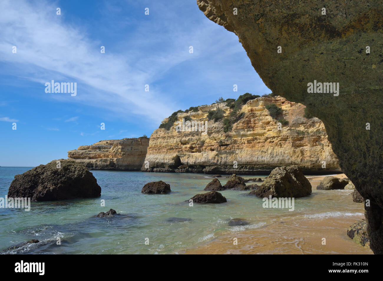 Beach scene in Albandeira Beach. Porches, Algarve, Portugal Stock Photo ...