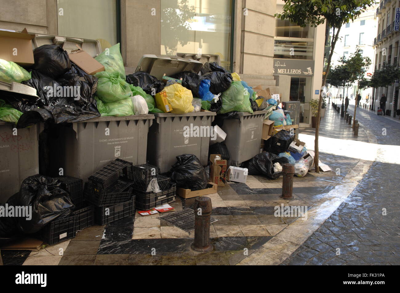 Dustbin men on strike in Malaga, rubbish piles up Stock Photo - Alamy