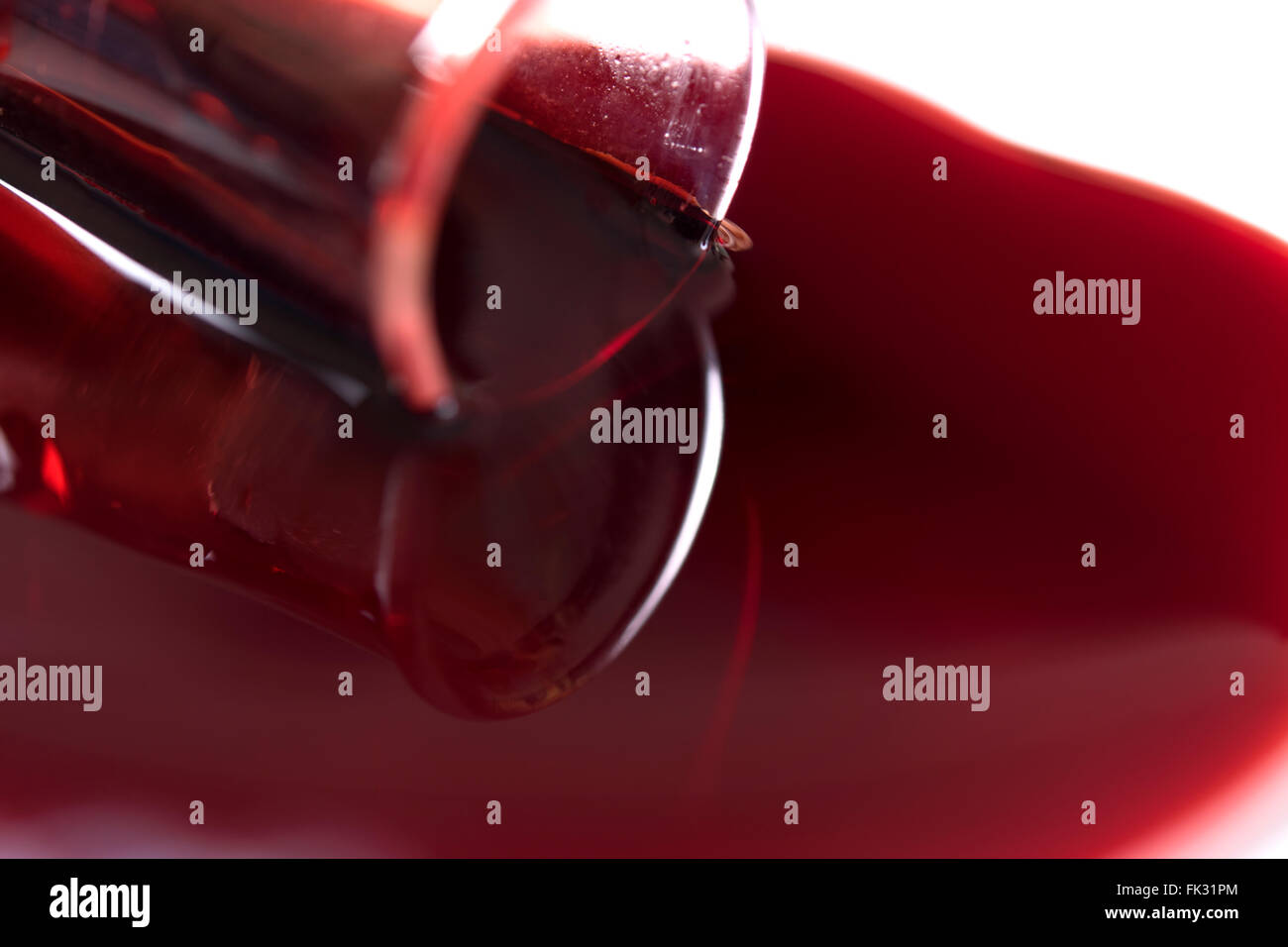 close up of blood spilling from test tube Stock Photo - Alamy