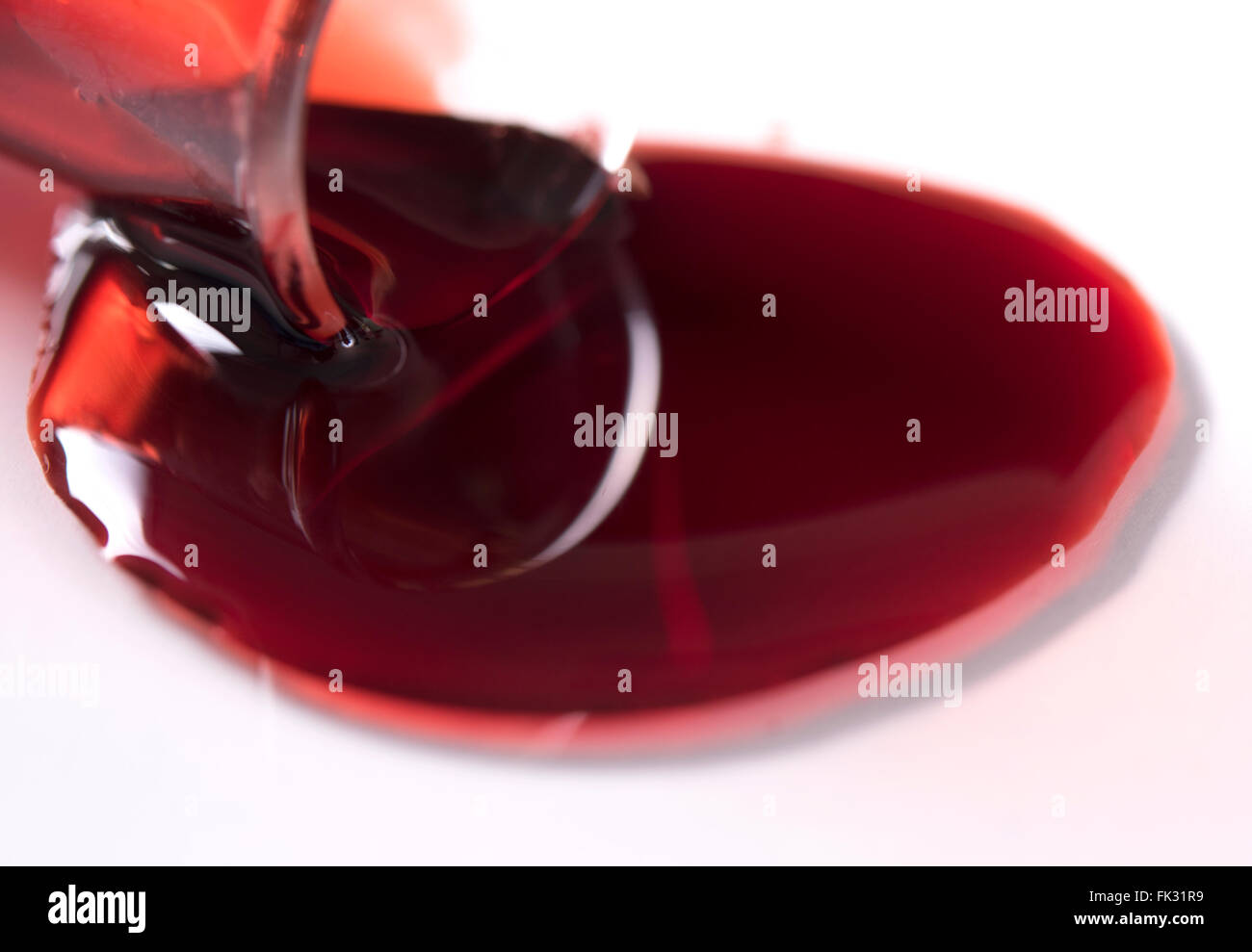 close up of blood spilling from test tube Stock Photo - Alamy