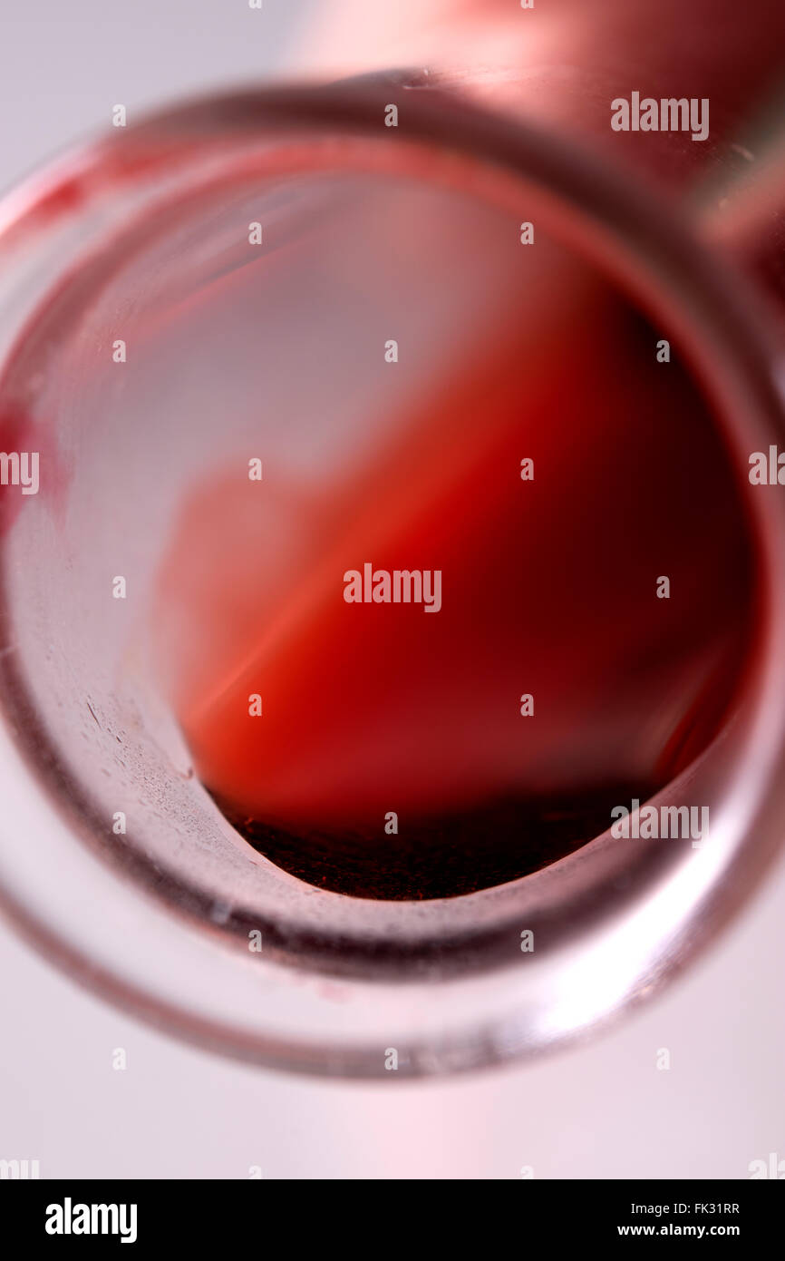 close up of blood spilling from test tube Stock Photo - Alamy