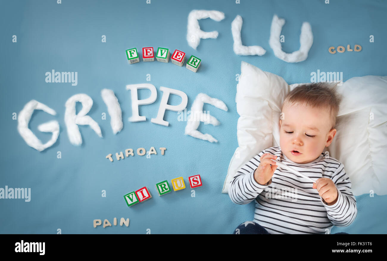 Ill boy lying in bed Stock Photo - Alamy