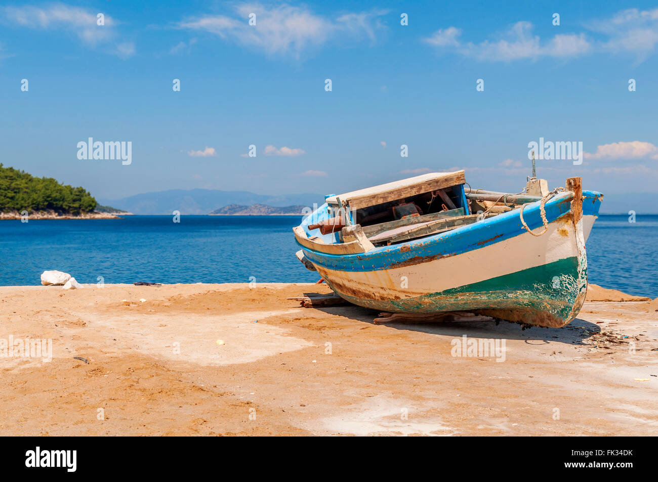 Old blue metal shabby fishing boat Stock Photo - Alamy