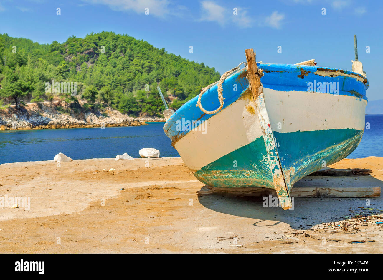 Old blue metal shabby fishing boat Stock Photo - Alamy