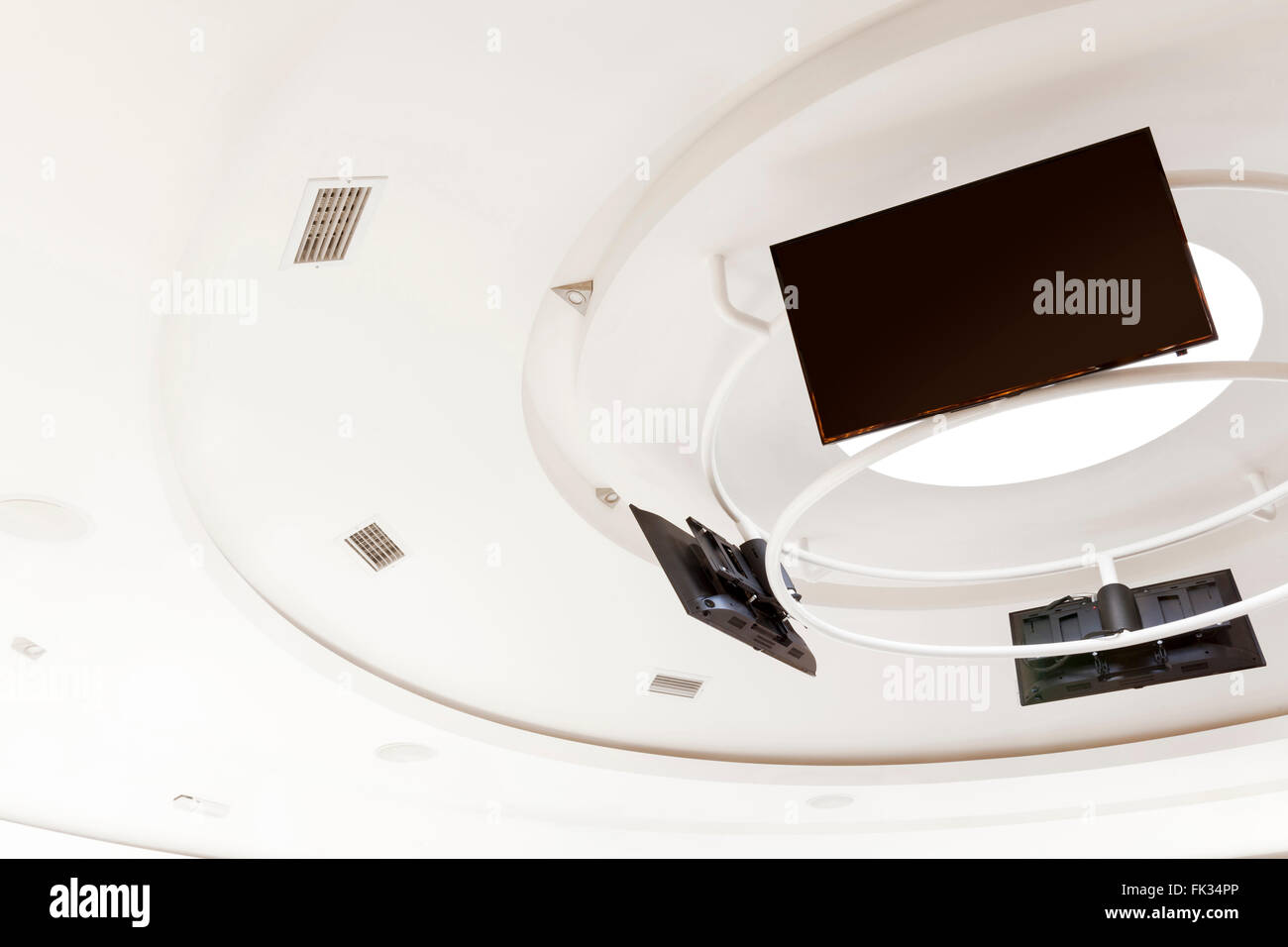 abstract interior background with led tv, televisions hanging from the ...