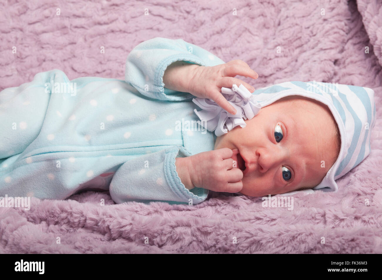 cute baby making a funny surprised face Stock Photo - Alamy