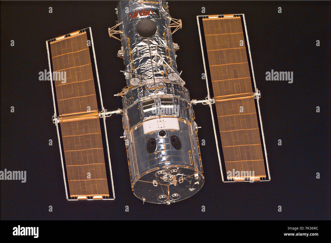 The Hubble Space Telescope floats away from the Space Shuttle Discovery ...