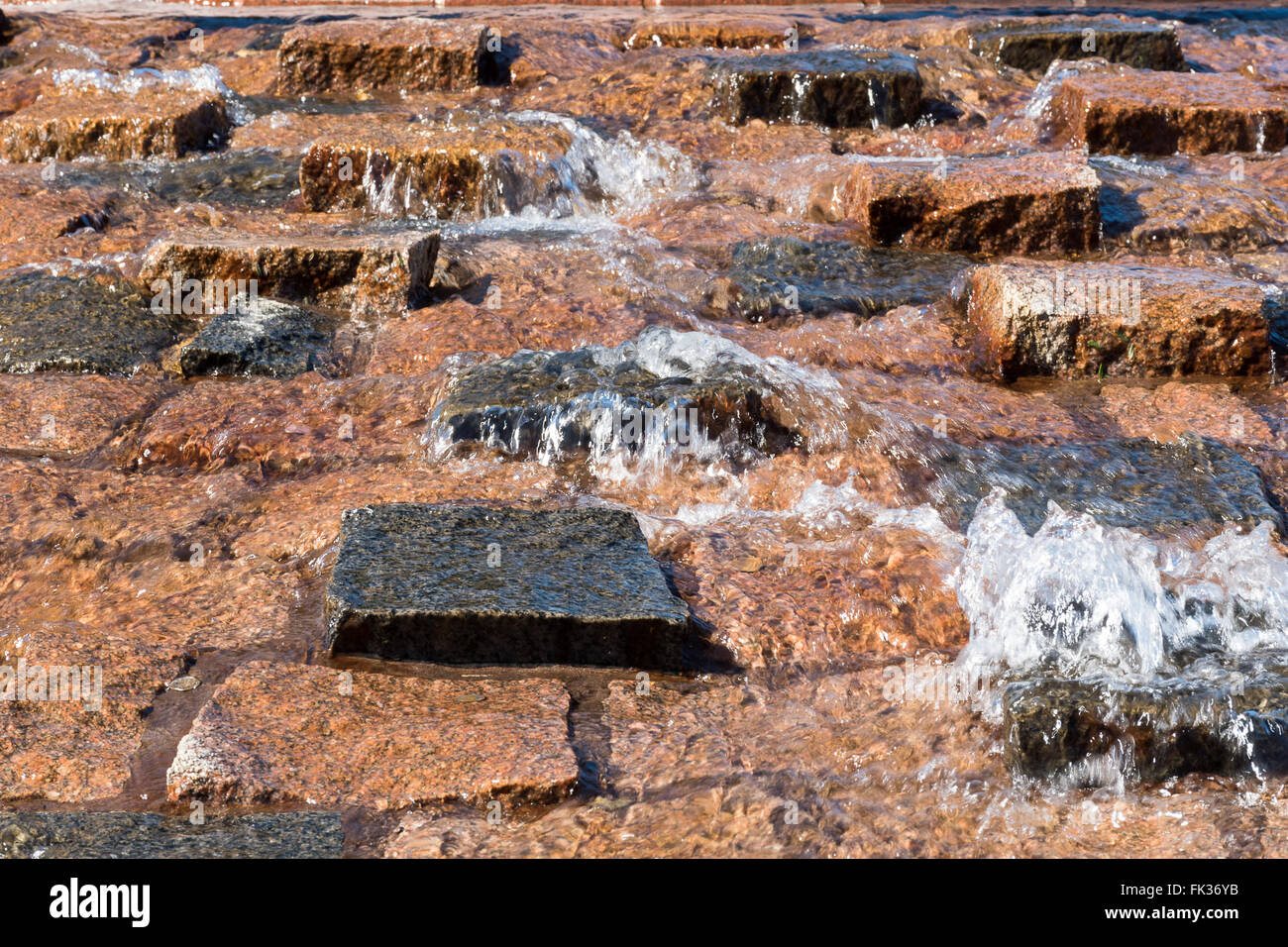 Water over stones hi-res stock photography and images - Alamy