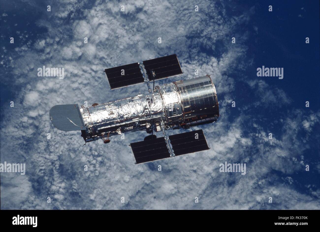 The Hubble Space Telescope floats away from the Space Shuttle Columbia ...