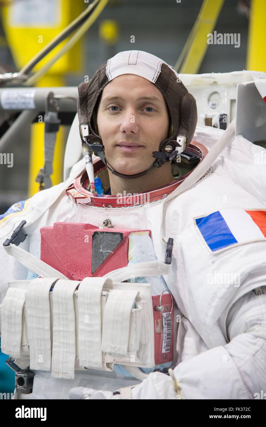 ESA astronaut Thomas Pesquet in his Extravehicular Mobility Unit space ...