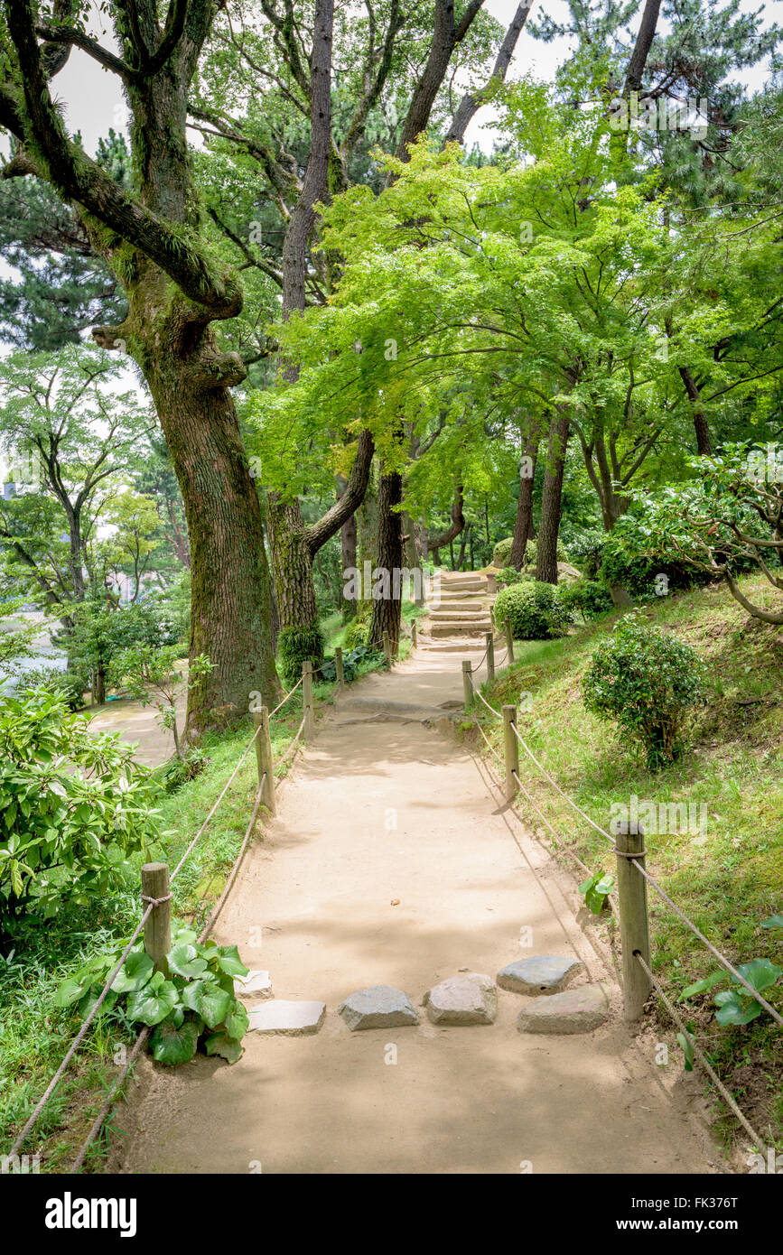 Foot path leads through a famous Japanese garden Stock Photo - Alamy