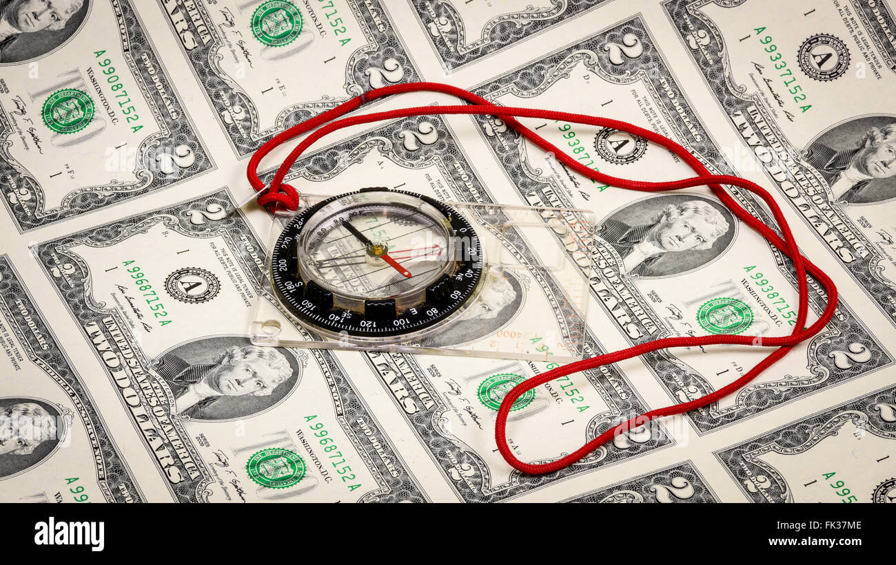 Money compass hi-res stock photography and images - Alamy
