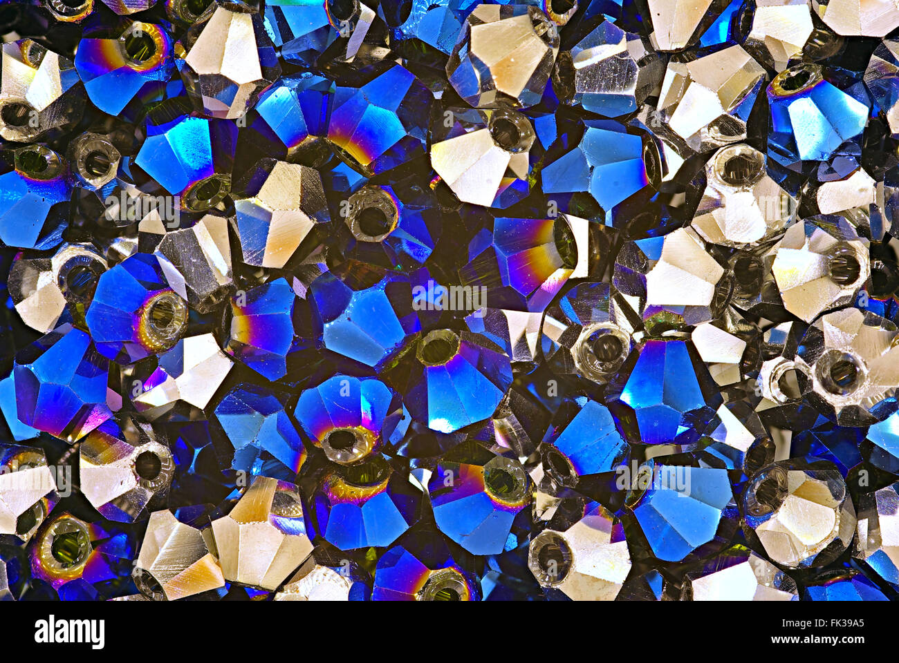 Blue and metallic swarovski crystals beads close up Stock Photo - Alamy