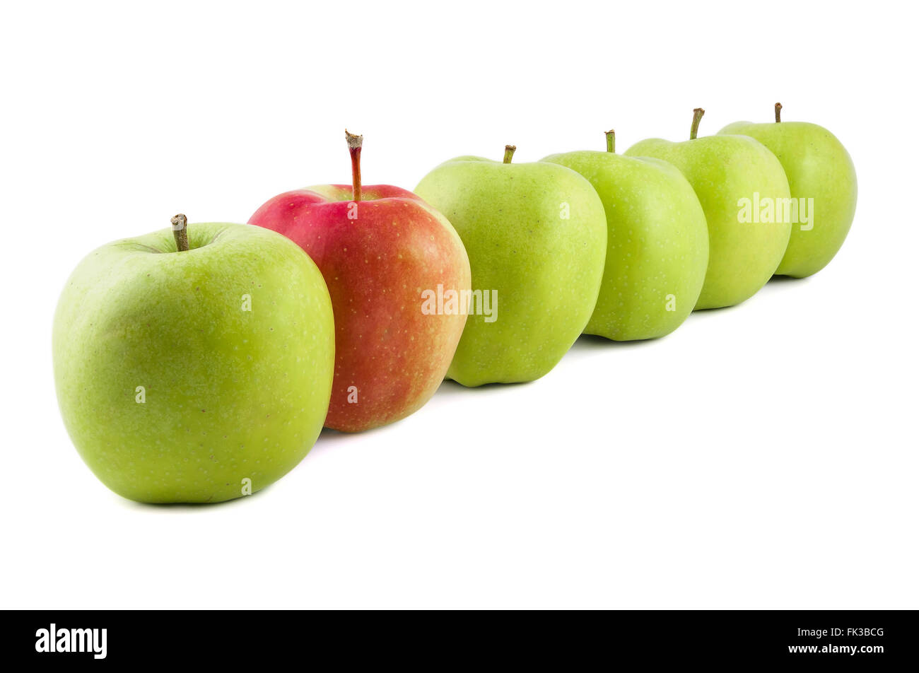 Red apple in a row of green apples isolated on white background with ...