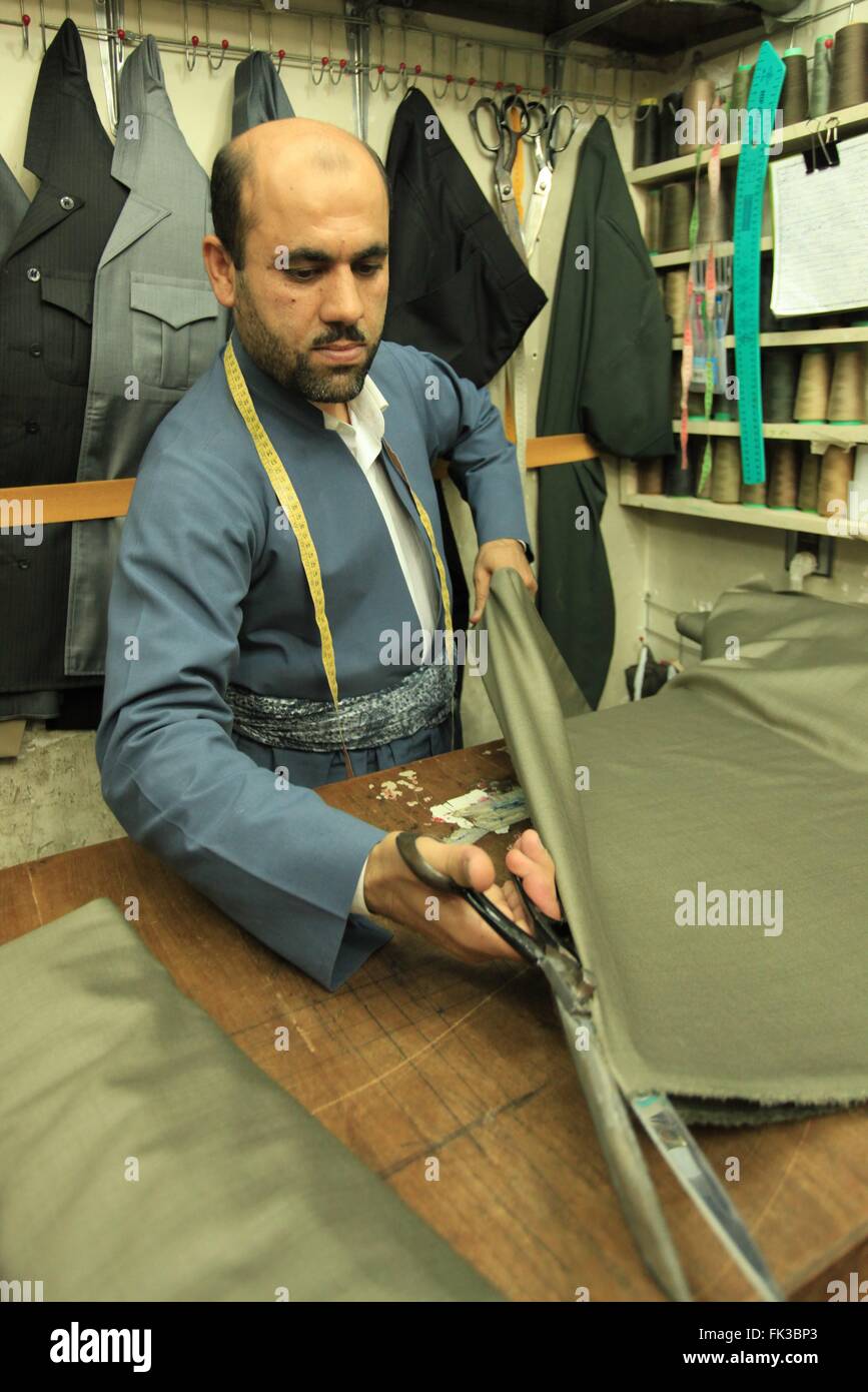 A Kurdish tailor in his workshop at Erbil bazaar Stock Photo - Alamy