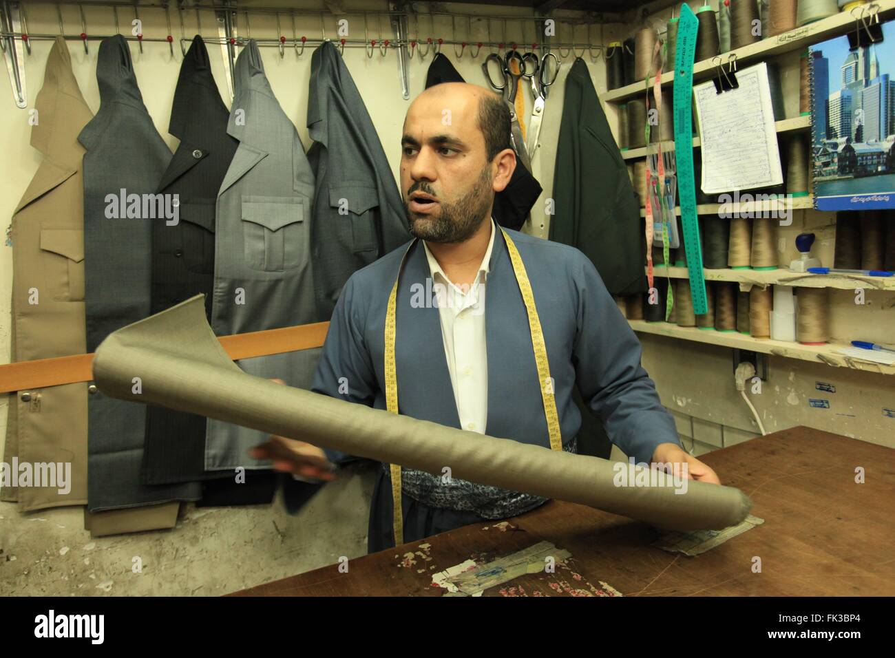 A Kurdish tailor in his workshop at Erbil bazaar Stock Photo - Alamy