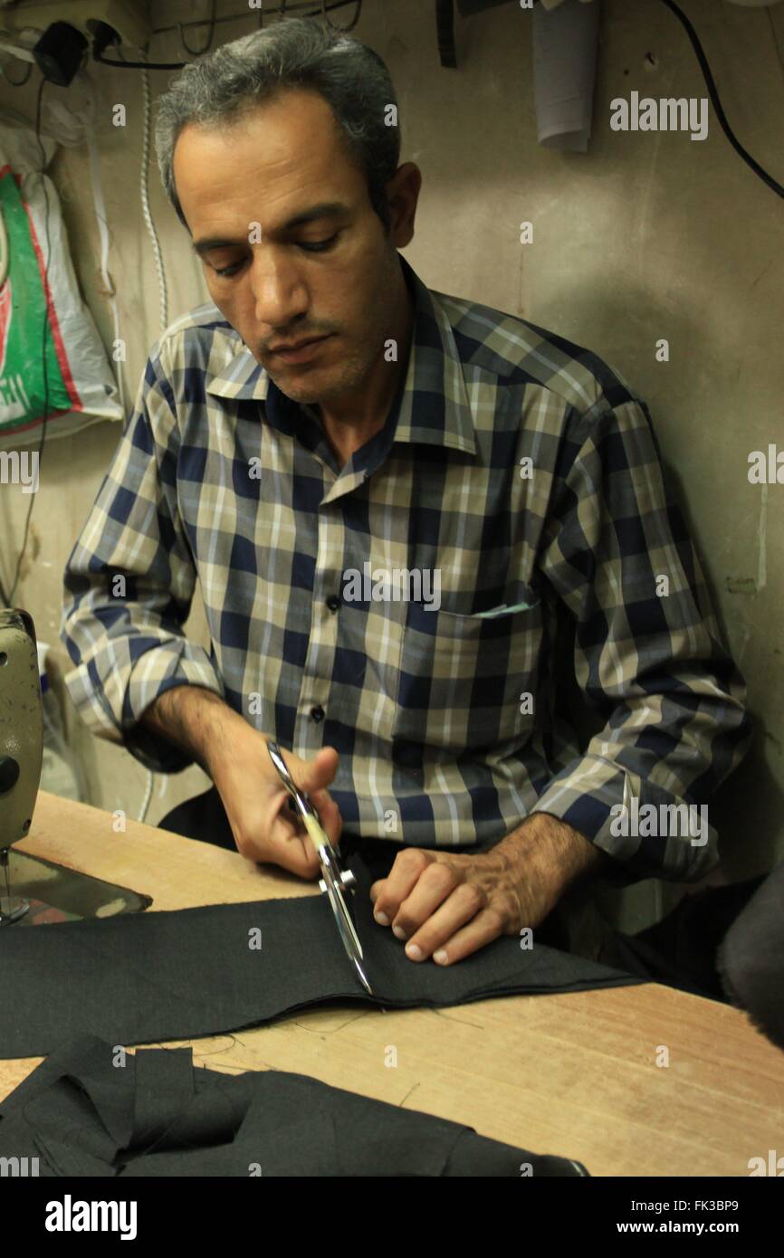 A Kurdish tailor in his workshop at Erbil bazaar Stock Photo - Alamy