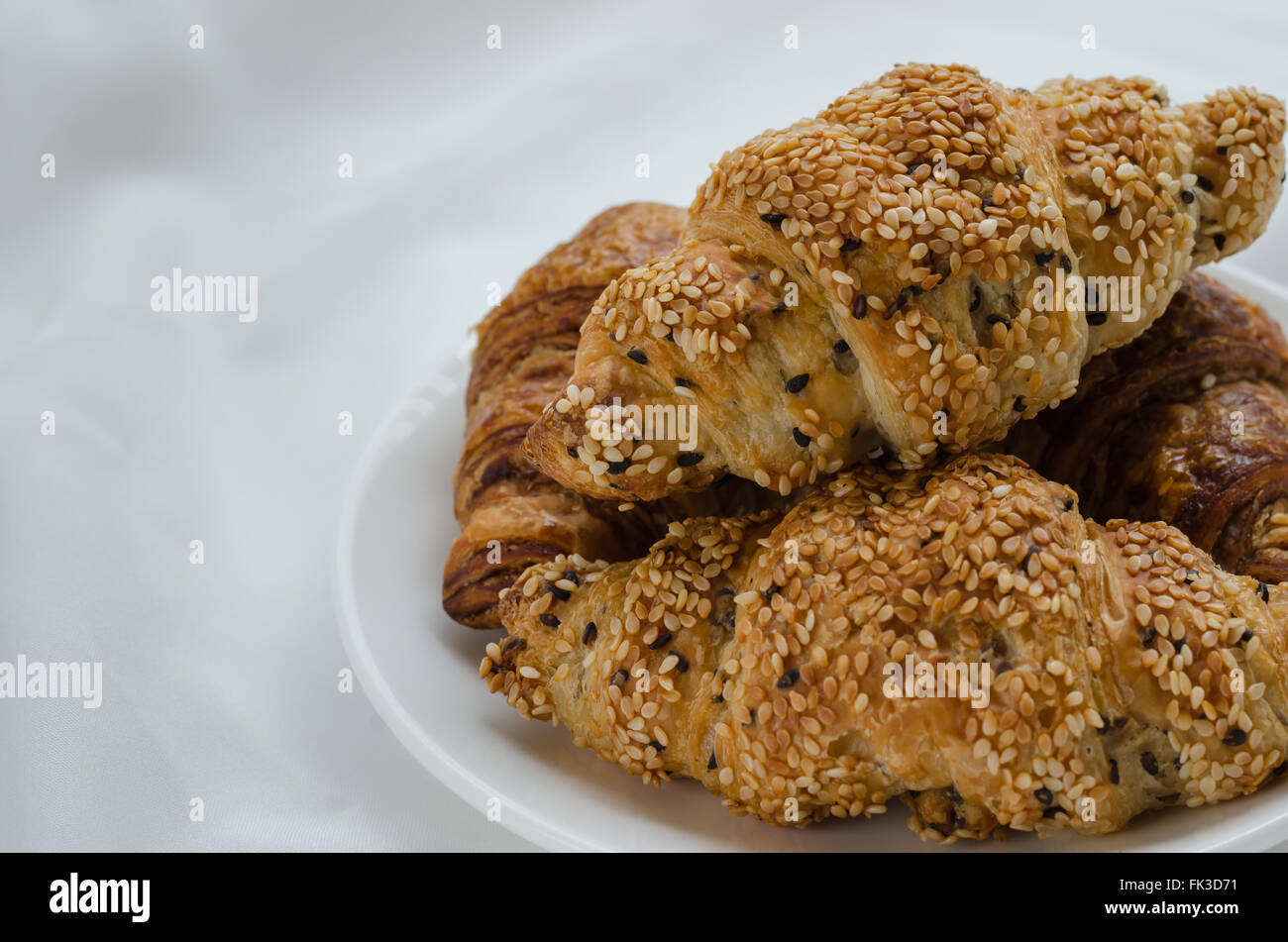 Sesame Croissant for Breakfast Stock Photo - Alamy