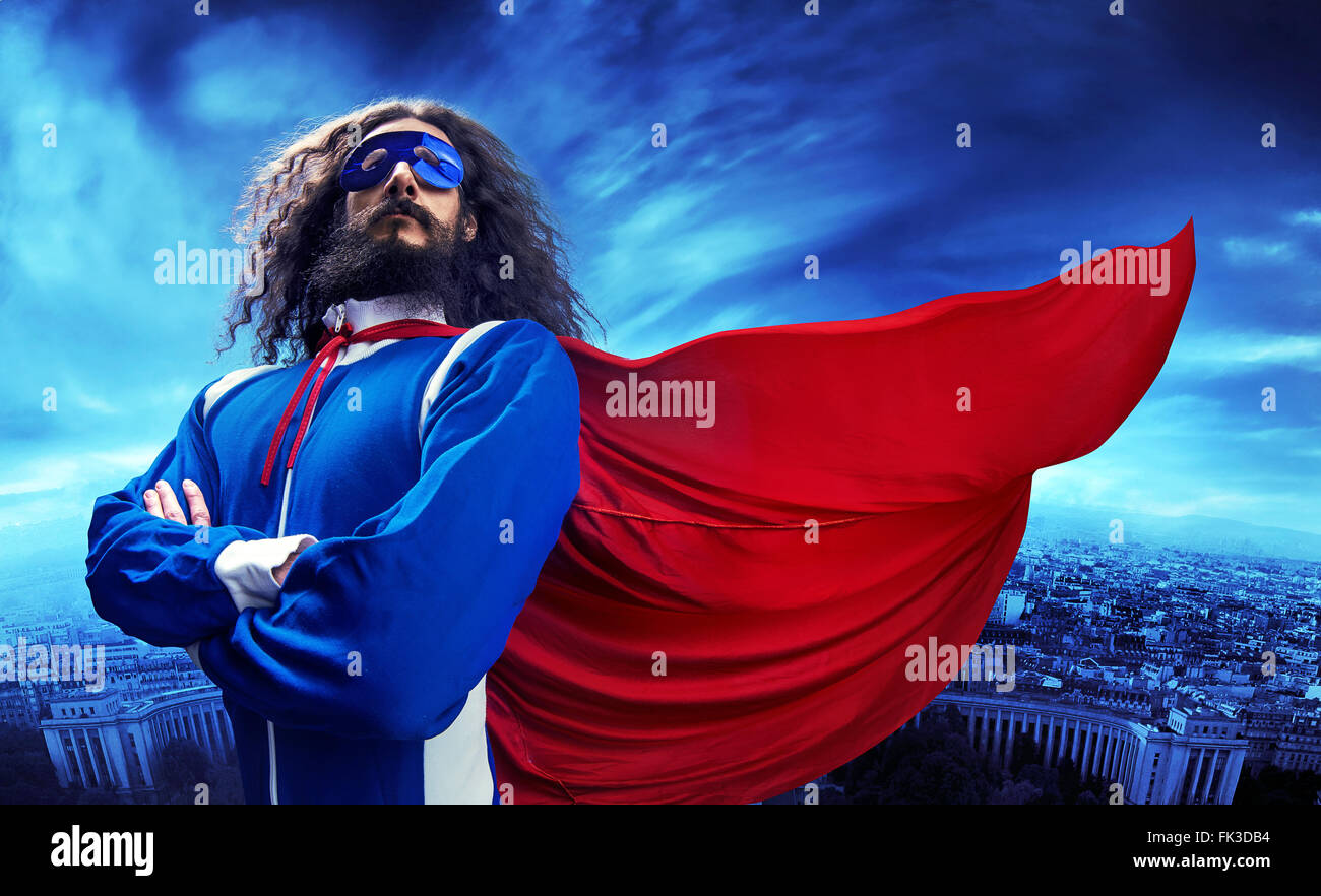 Portrait of a city watchman posing over the urban landscape Stock Photo ...