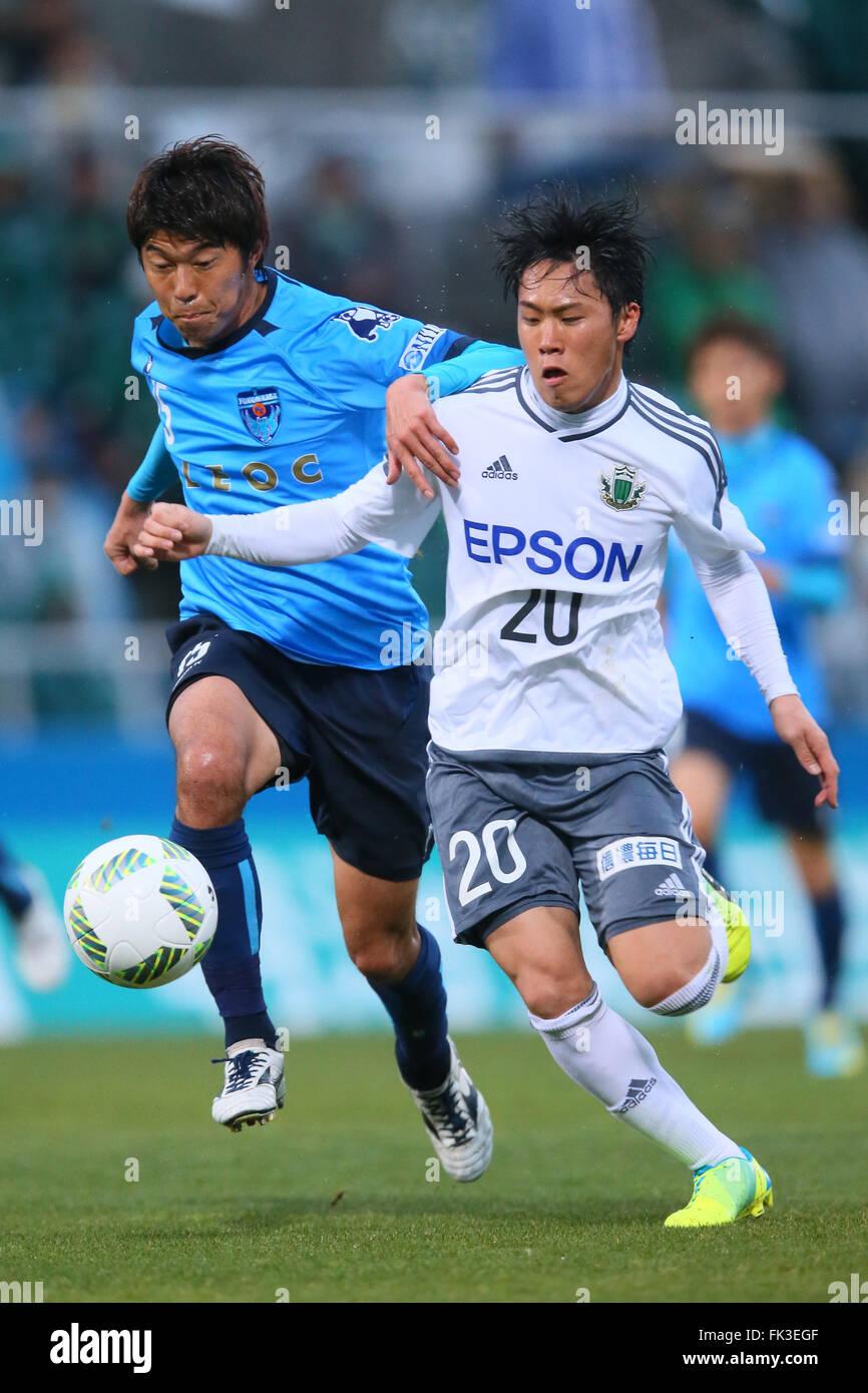 NHK Spring Mitsuzawa Football Stadium, Kanagawa, Japan. 6th Mar, 2016. (L to R) Atsushi Ichimura ...
