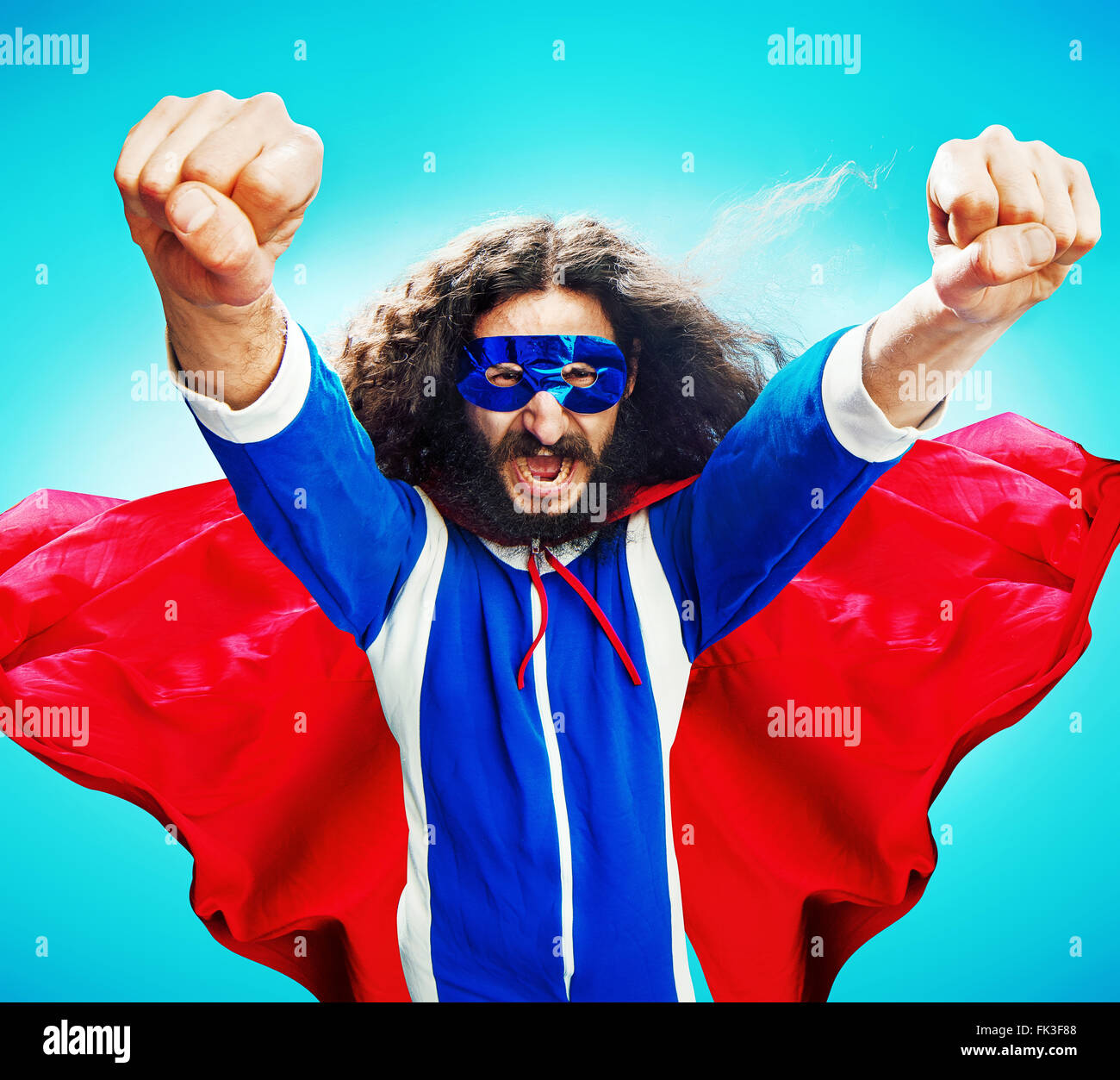 Funny portrait of a skinny superhero Stock Photo - Alamy