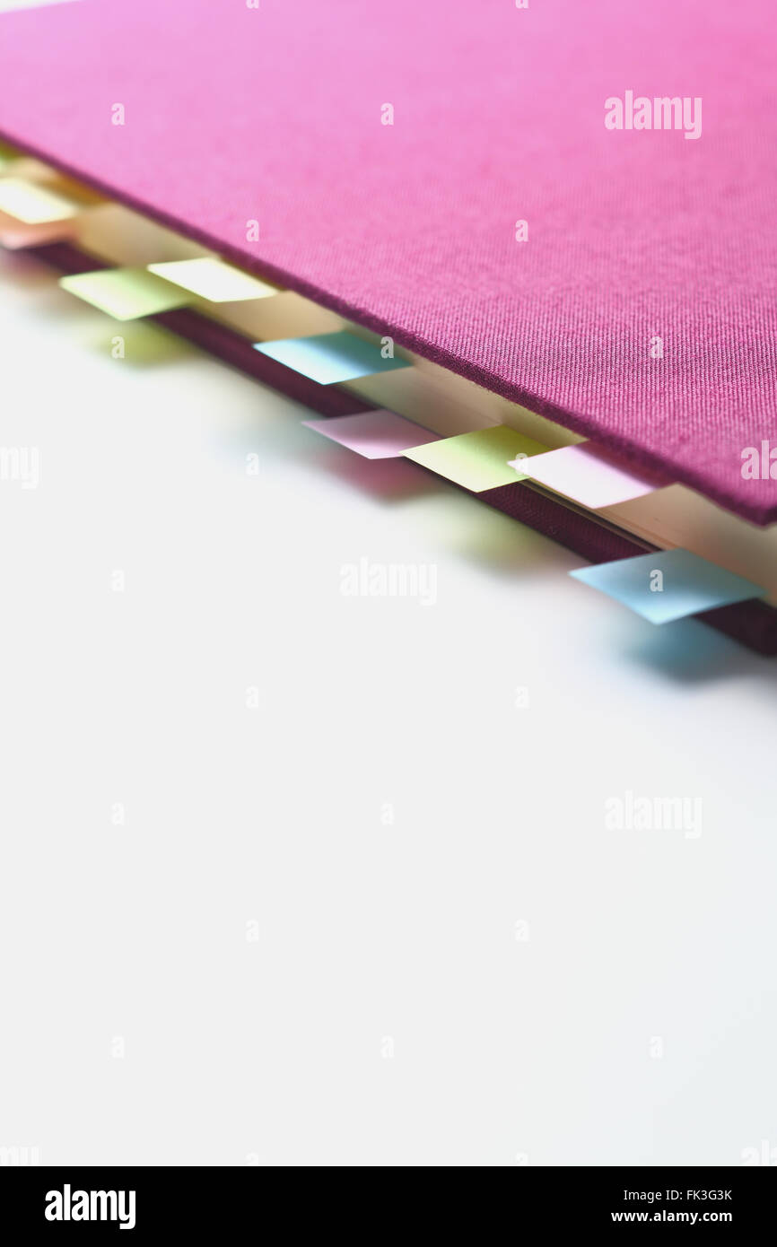 Post-it notes on a notebook Stock Photo - Alamy