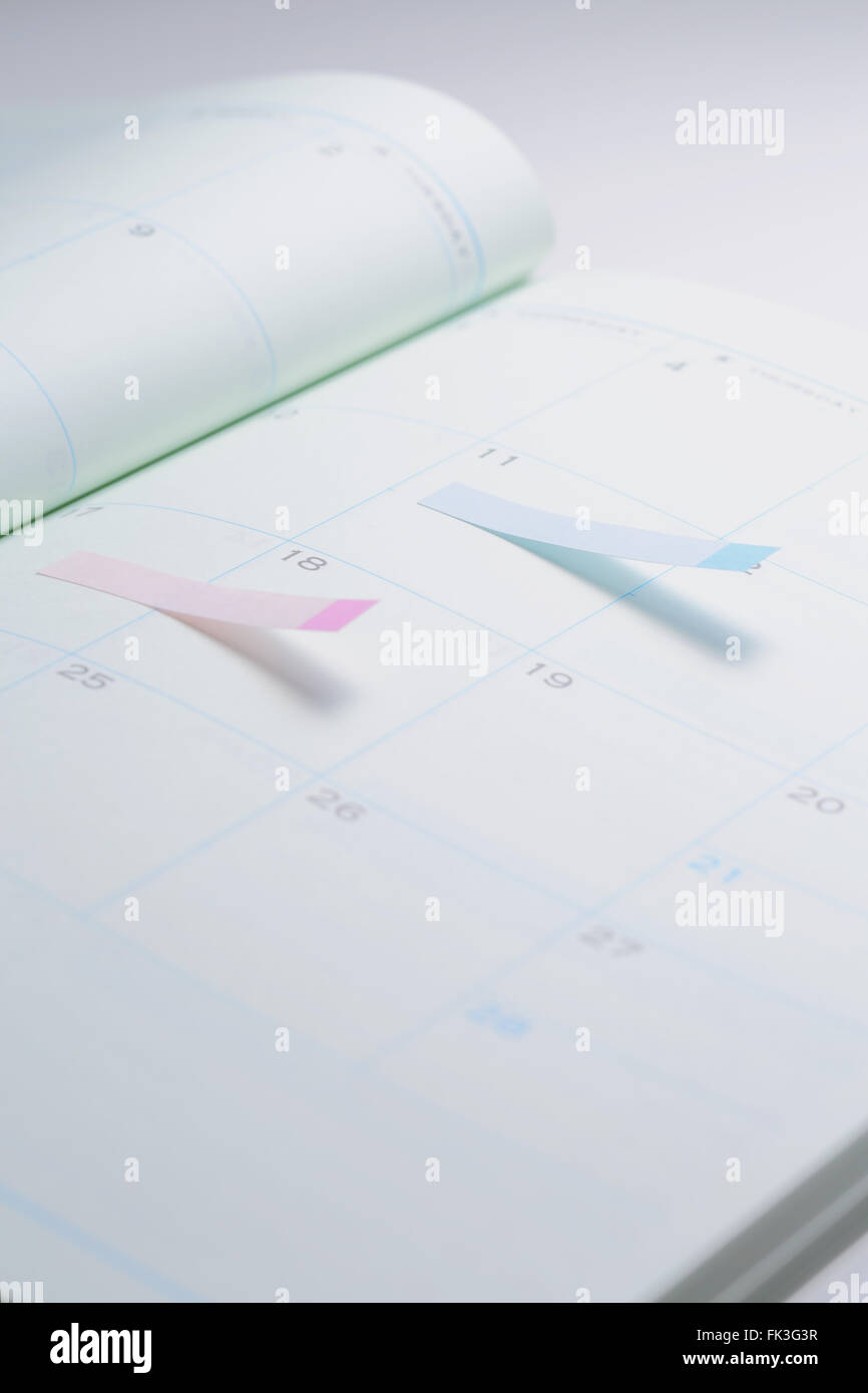 Post-it notes on a notebook Stock Photo - Alamy