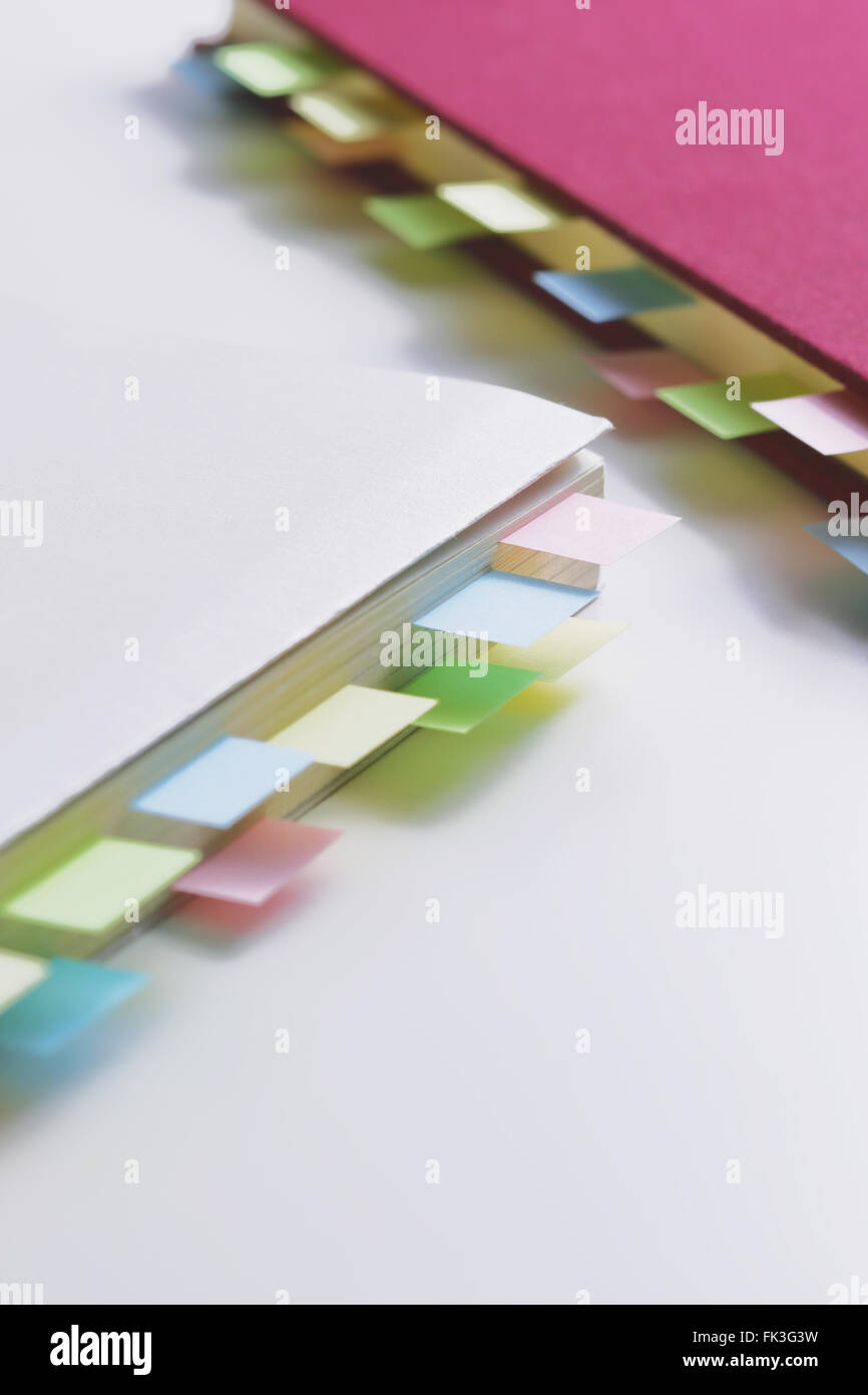 Post-it notes on a notebook Stock Photo - Alamy