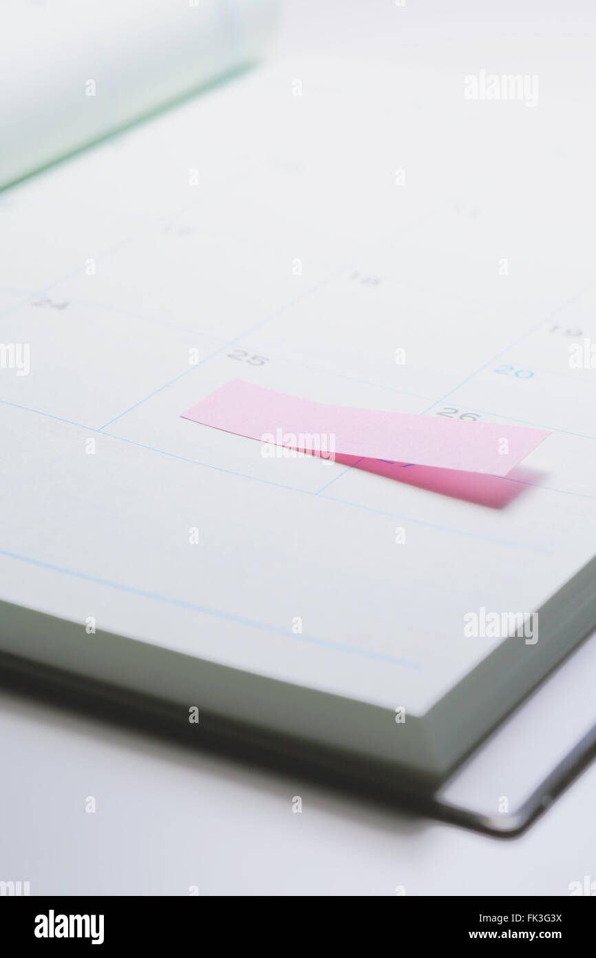 Post-it notes on a notebook Stock Photo - Alamy