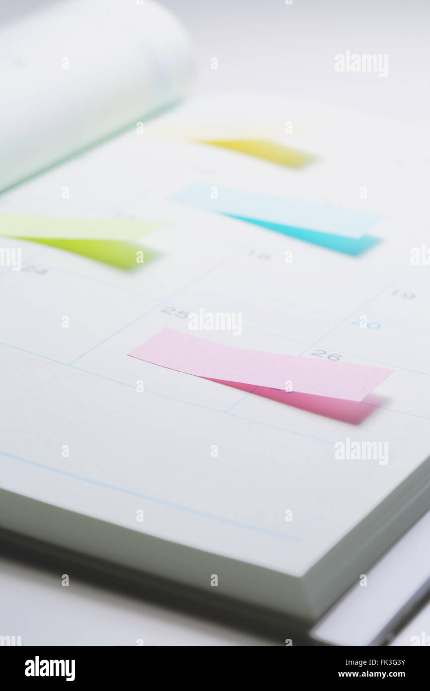 Post-it notes on a notebook Stock Photo - Alamy