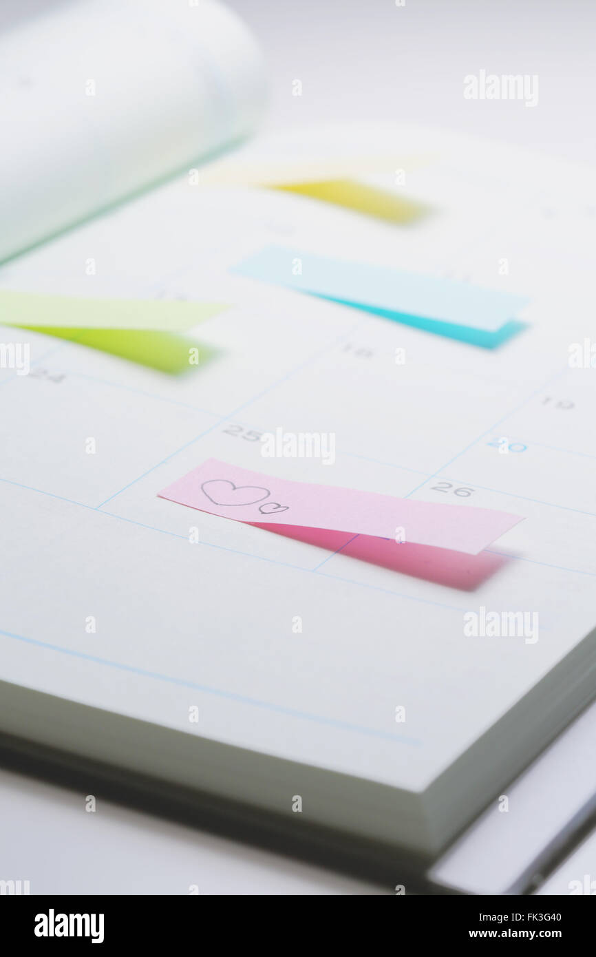 Post-it notes on a notebook Stock Photo - Alamy