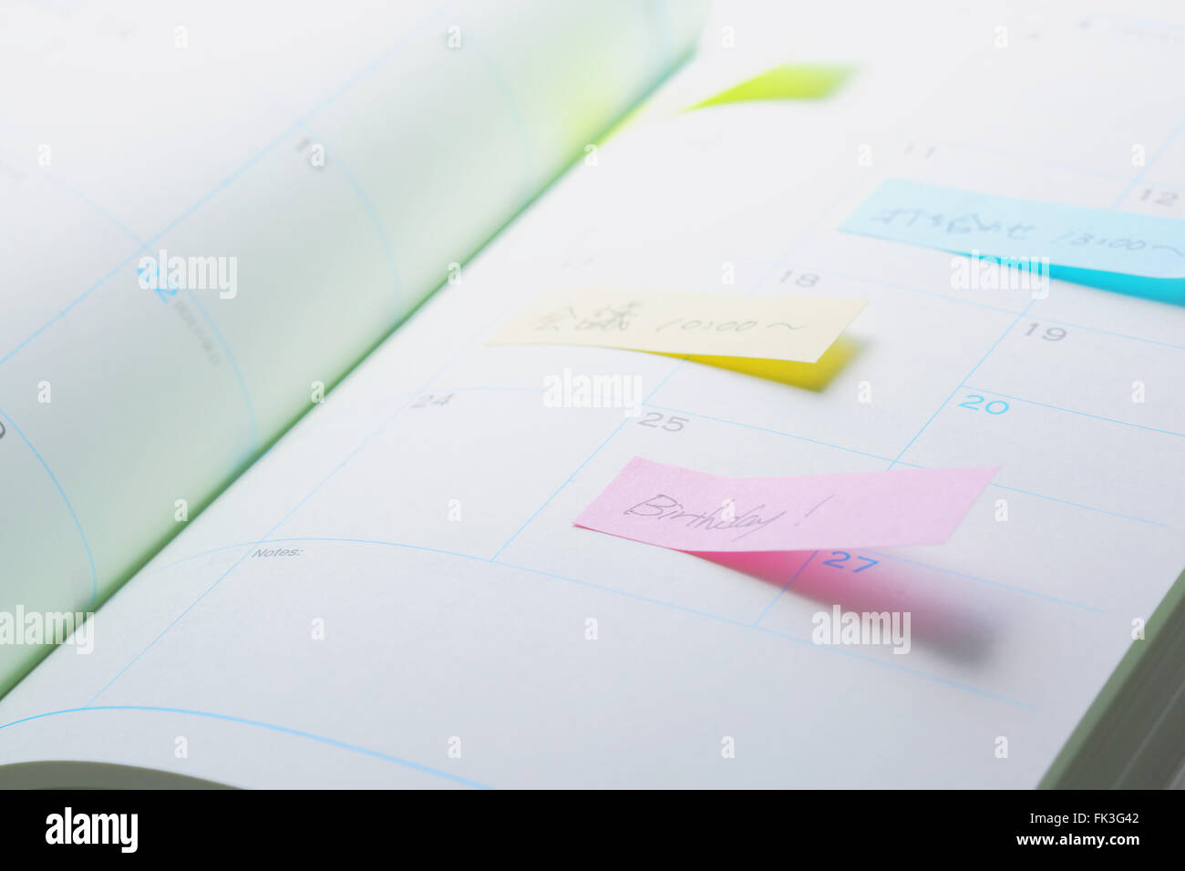 Post-it notes on a notebook Stock Photo - Alamy