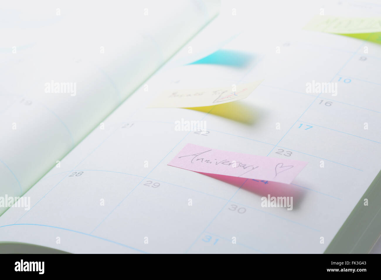 Post-it notes on a notebook Stock Photo - Alamy