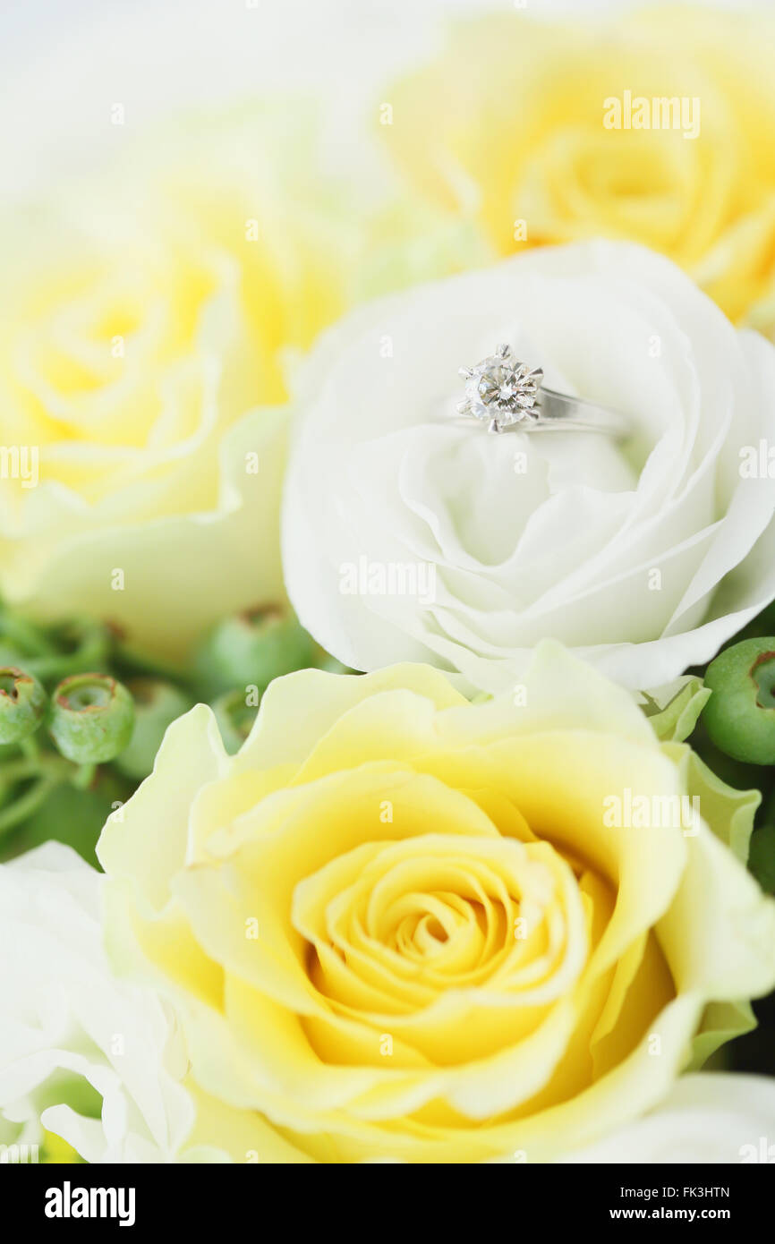 Flower bouquet and diamond ring Stock Photo - Alamy