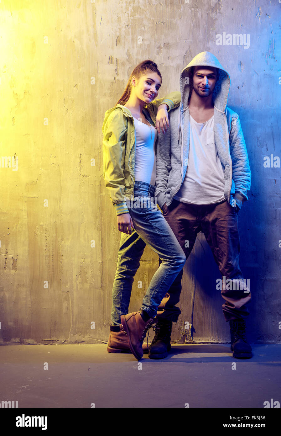 Portrait of two young hip-hop dancers on a concrete background Stock ...