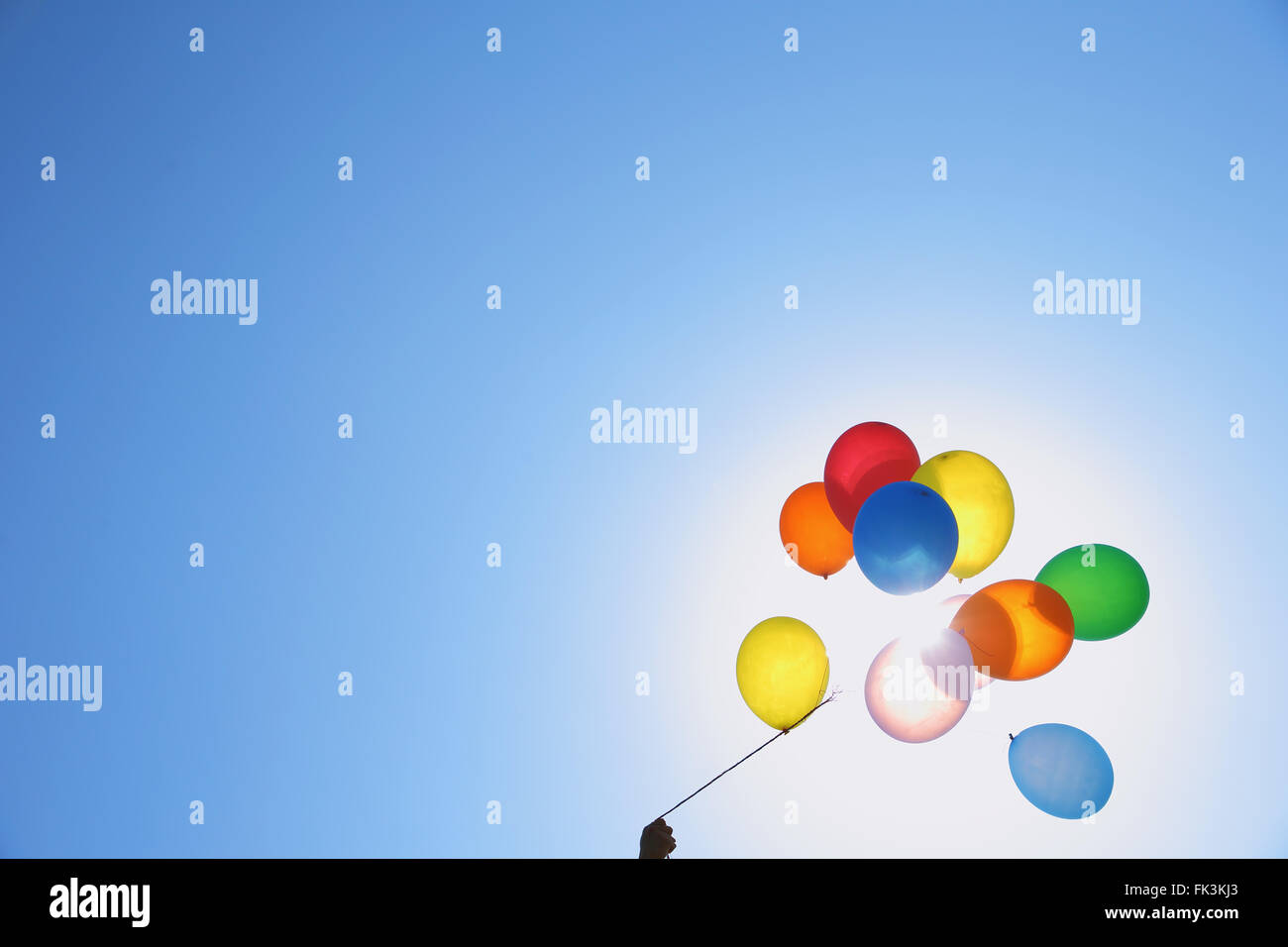 Balloon sky hands hi-res stock photography and images - Alamy