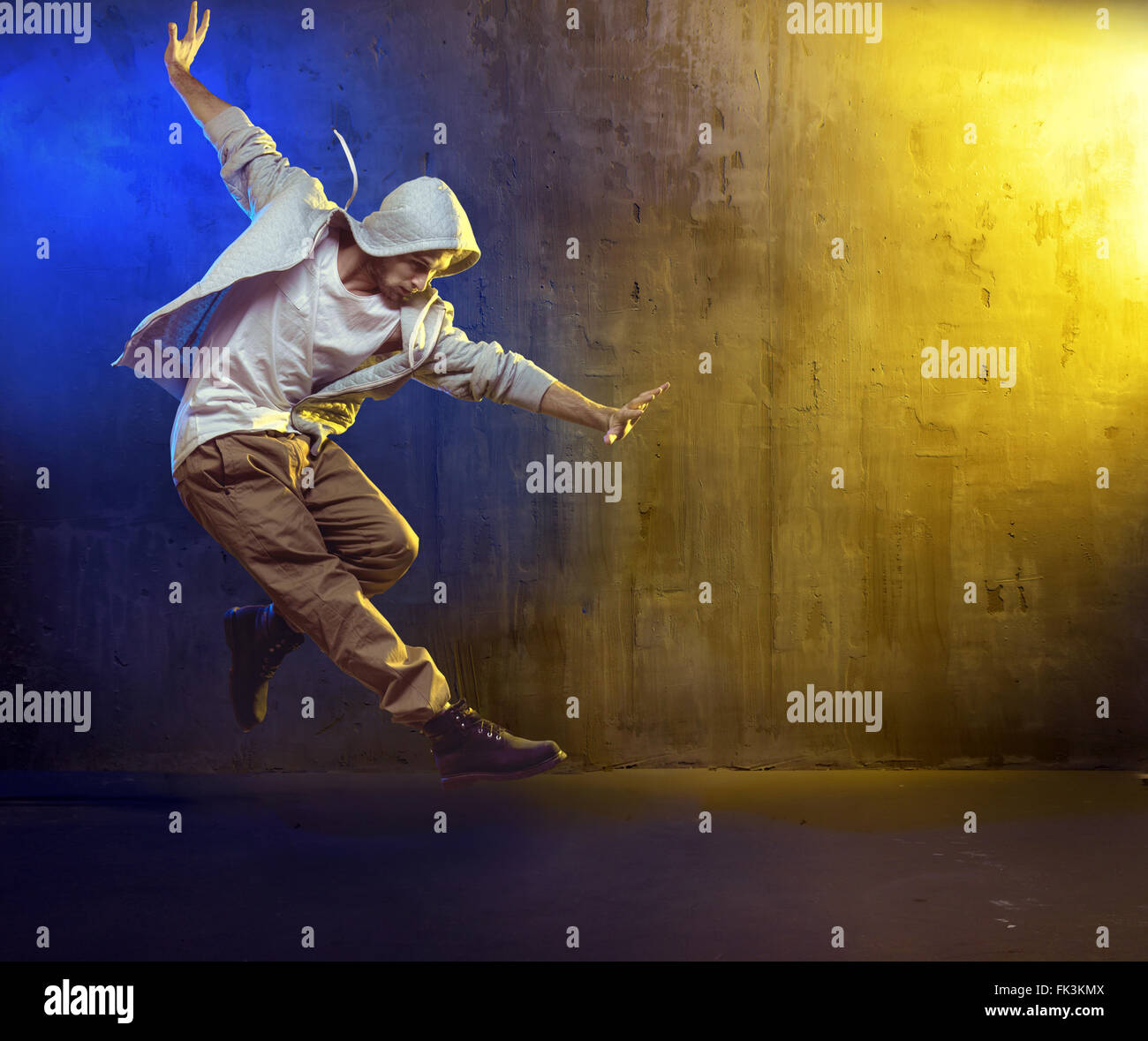 Athletic b-boy dancing a hip hop Stock Photo - Alamy