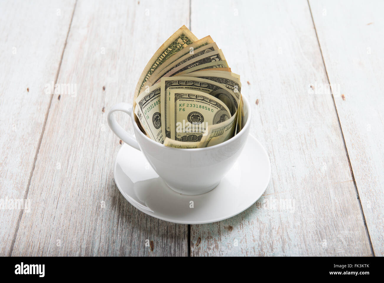 Coffee cup with dollar sign hi-res stock photography and images - Alamy